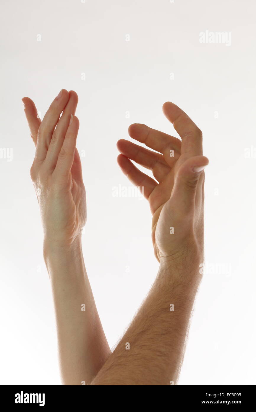 Playing hands of a couple Stock Photo - Alamy