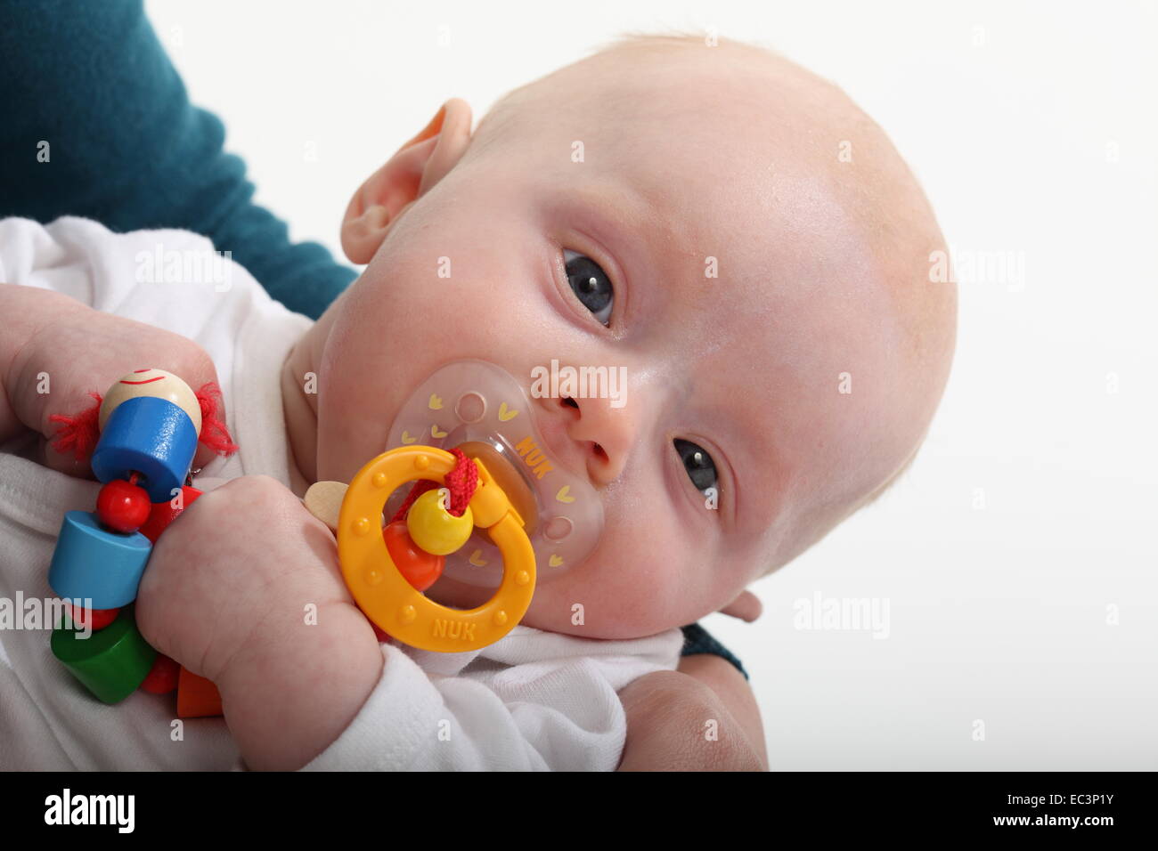 Baby with pacifier Stock Photo - Alamy