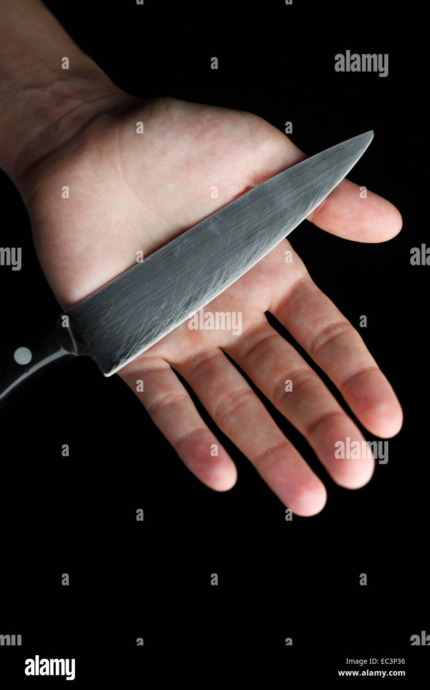 Knife in the hand Stock Photo - Alamy