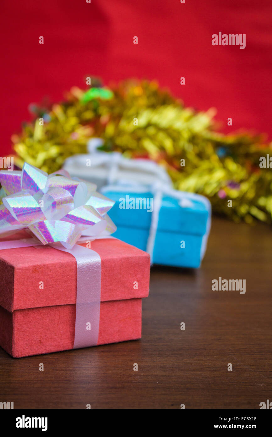 Colorful of gift boxes on a table Stock Photo - Alamy