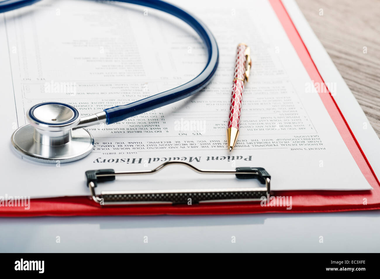 medical history with stethoscope and pen Stock Photo - Alamy