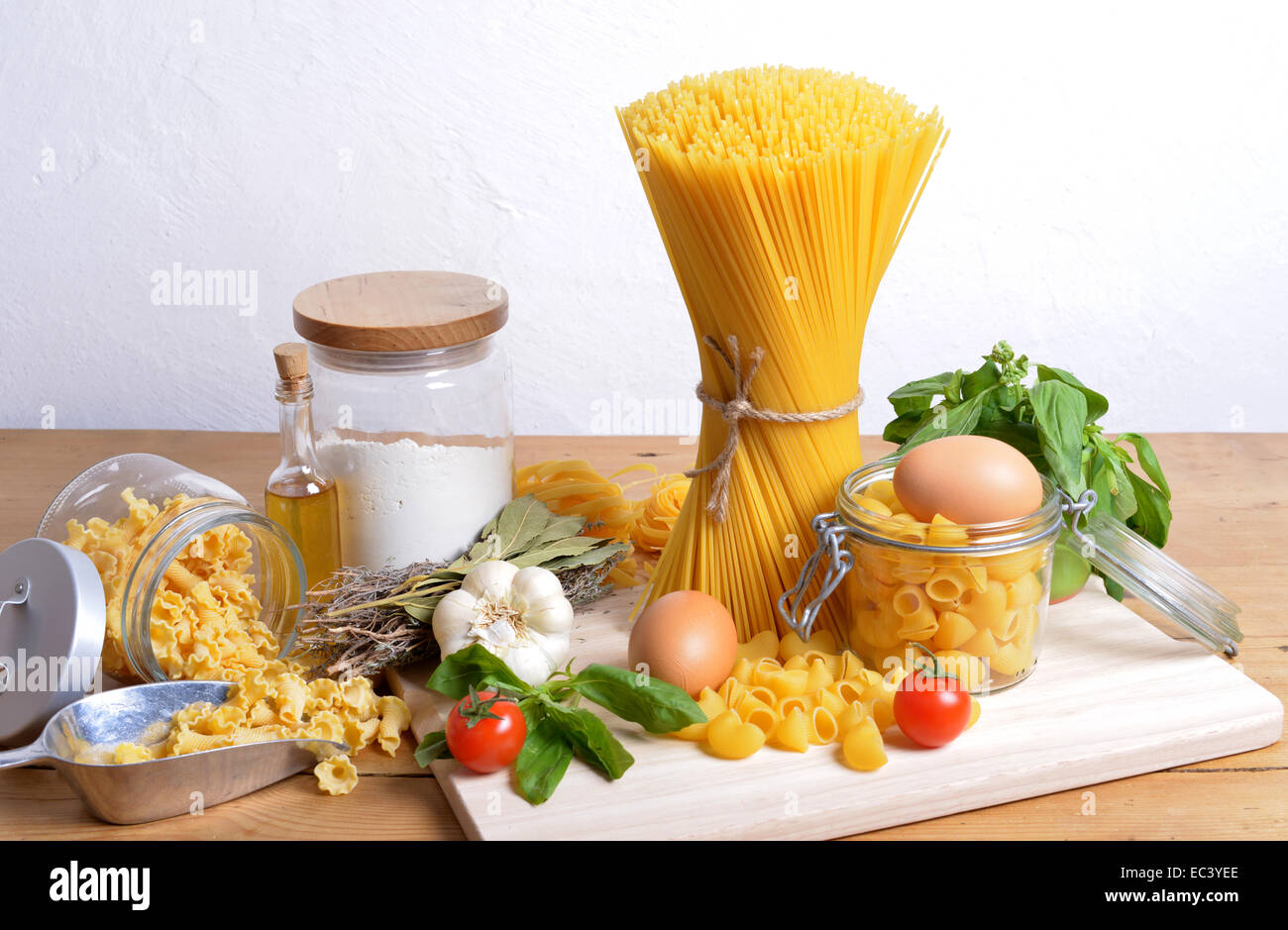 Still life with traditional italian pasta and ingredients Stock Photo ...