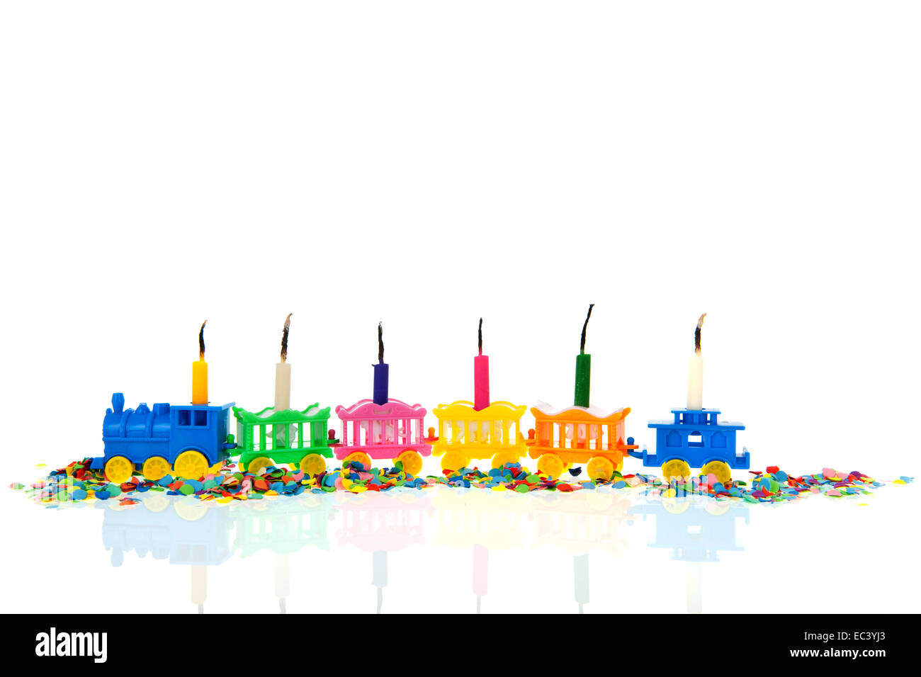Birthday train with burned candles isolated over white background Stock ...