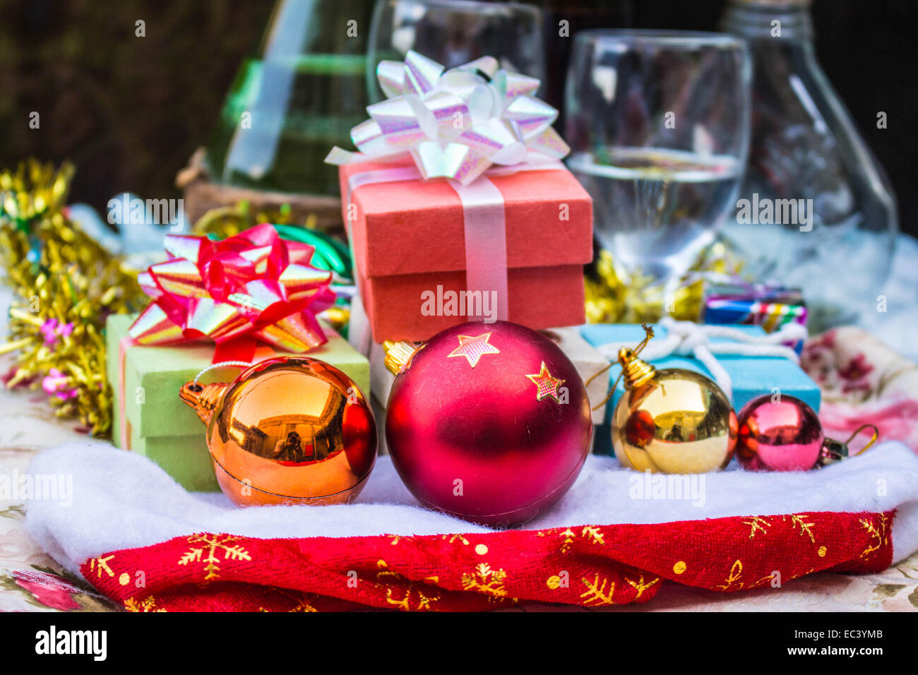 Red balls and gift boxes for the festival Stock Photo - Alamy