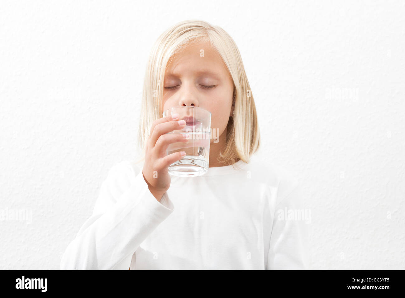 Girl drinks water Stock Photo - Alamy