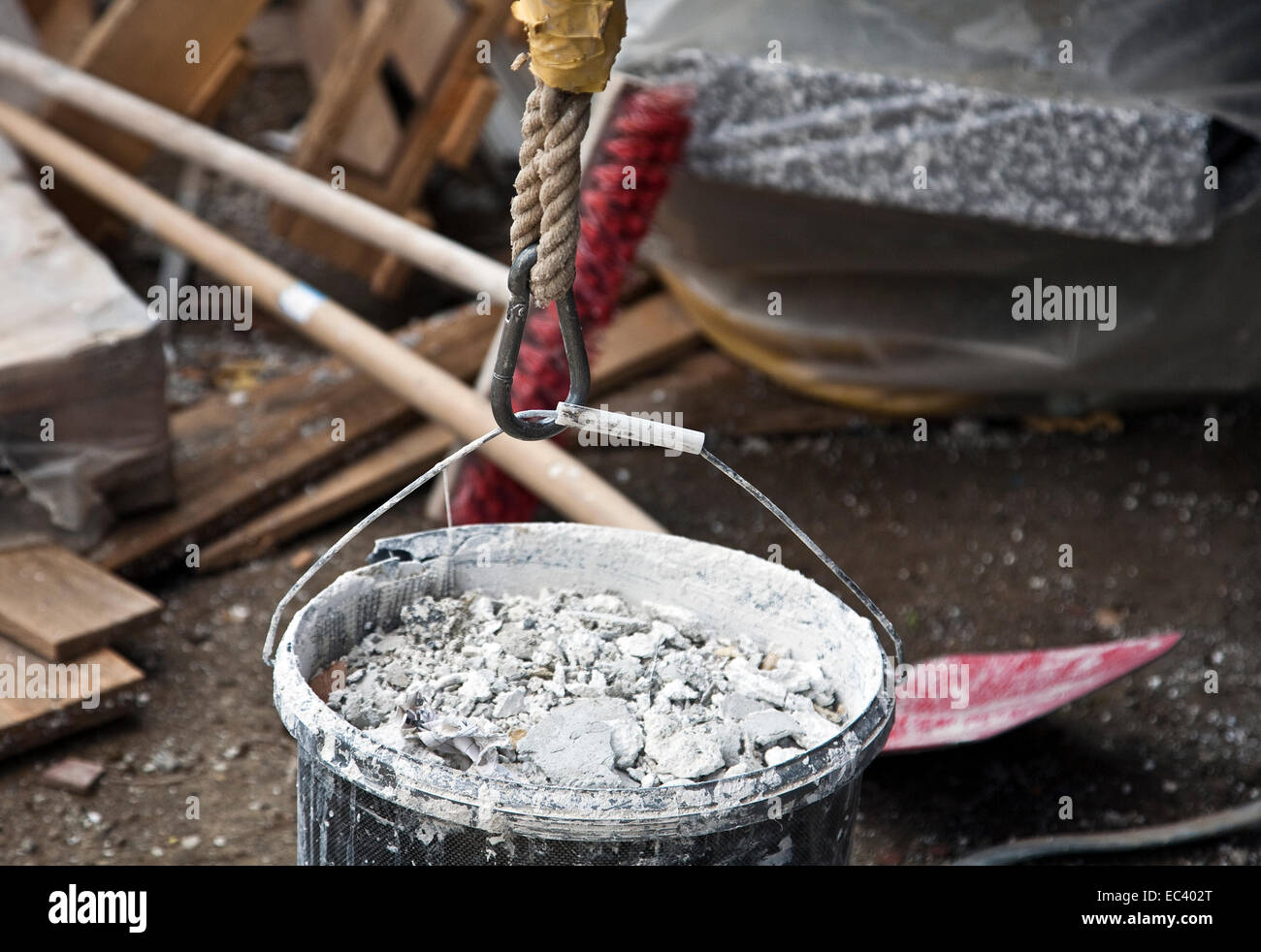 Bucket of rubble Stock Photo - Alamy