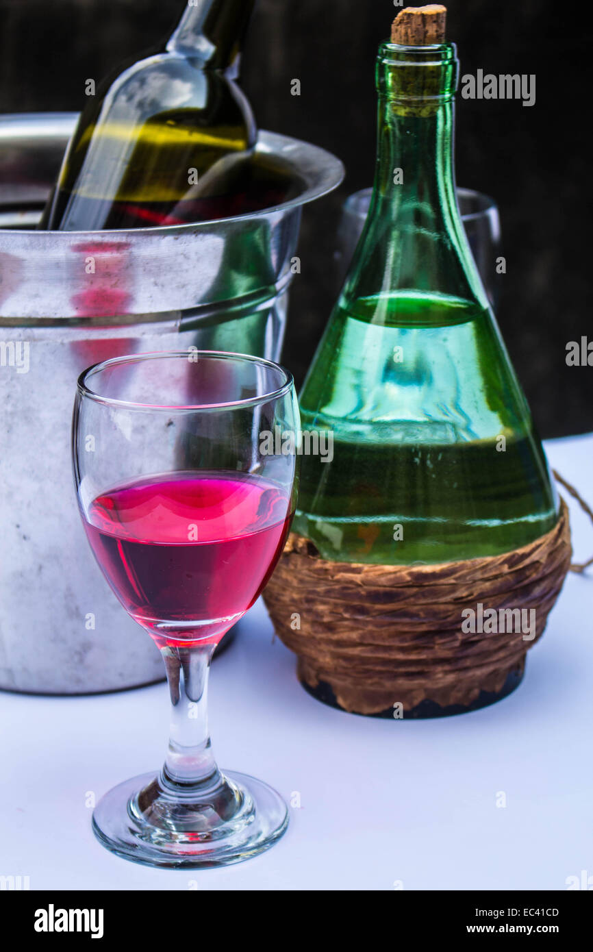 Glass of red wine on a dining table Stock Photo - Alamy
