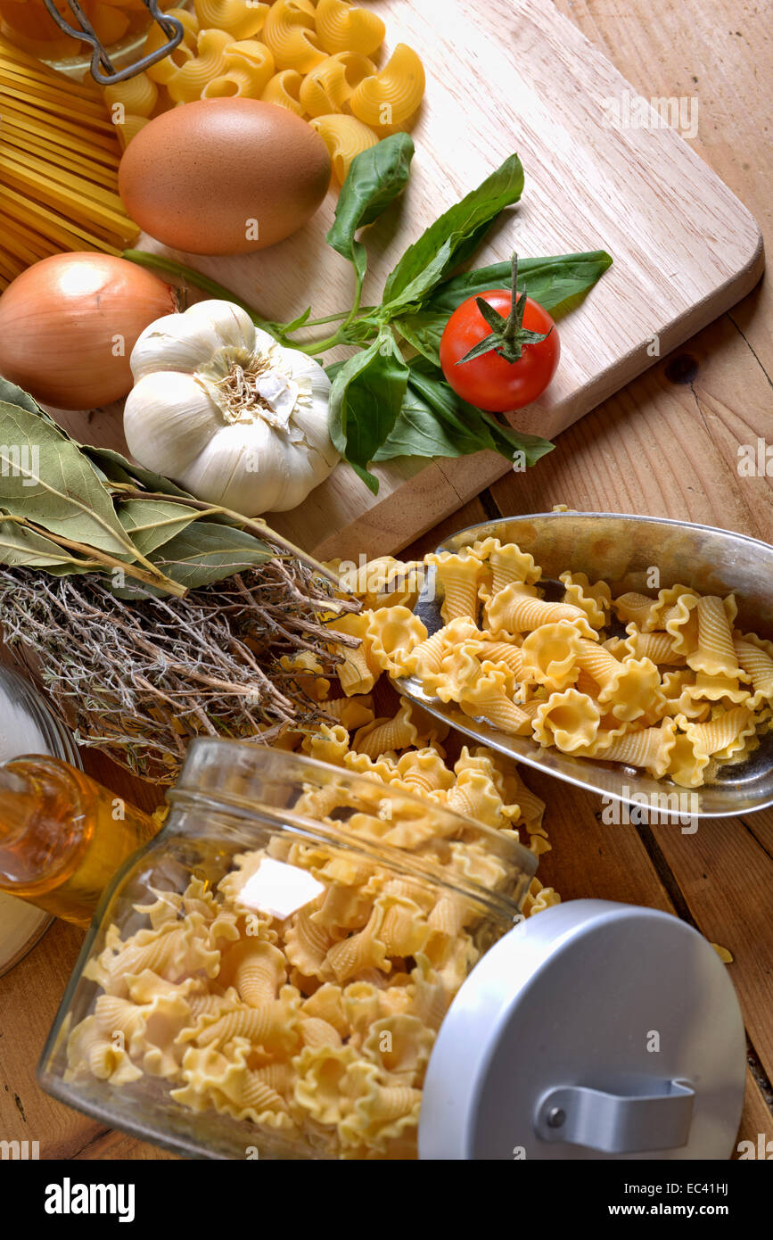 Assorted pasta with eggs and garlic on the wood table Stock Photo - Alamy