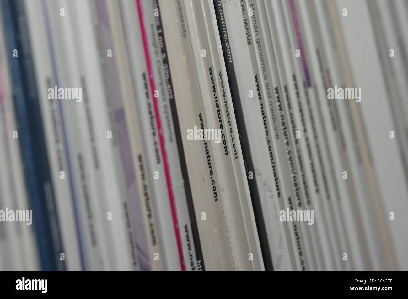 Scientific journals stacked on the library shelves Stock Photo - Alamy