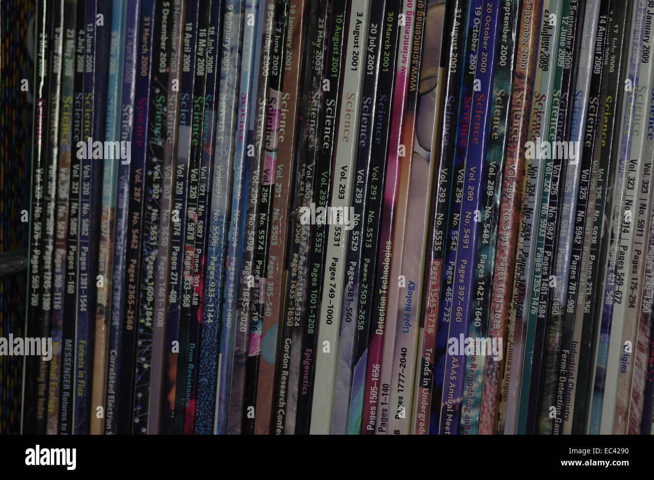 Scientific journals stacked on the library shelves Stock Photo - Alamy