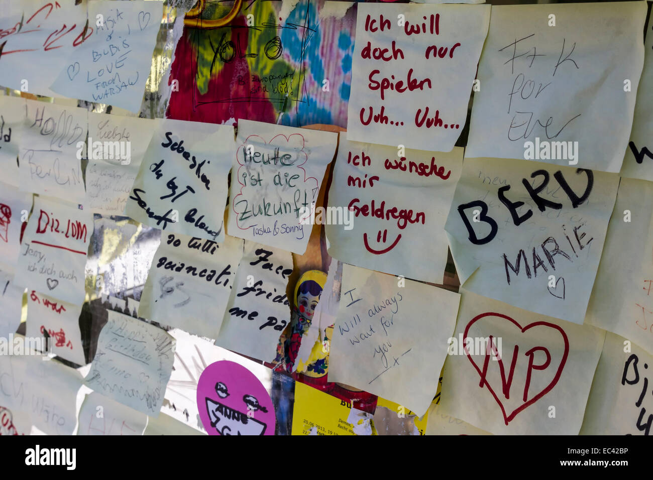 with sticky notes pasted phone booth in Berlin Stock Photo - Alamy