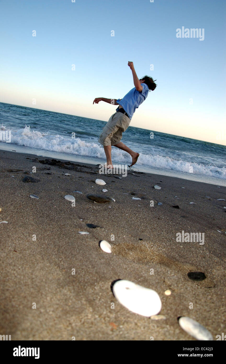 Man throwing stones hi-res stock photography and images - Alamy