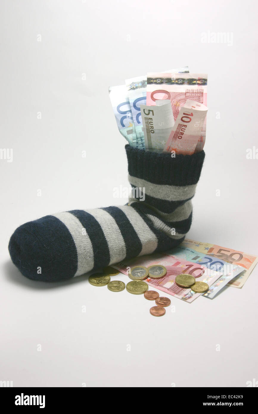 Money in sock hi-res stock photography and images - Alamy