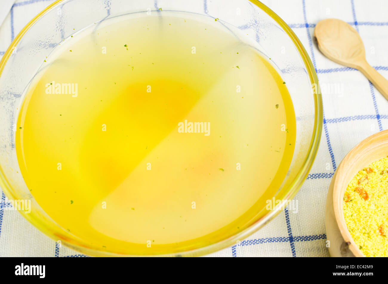 Broth, bouillon, clear soup? stock in a transparent bowl. Near bouillon ...