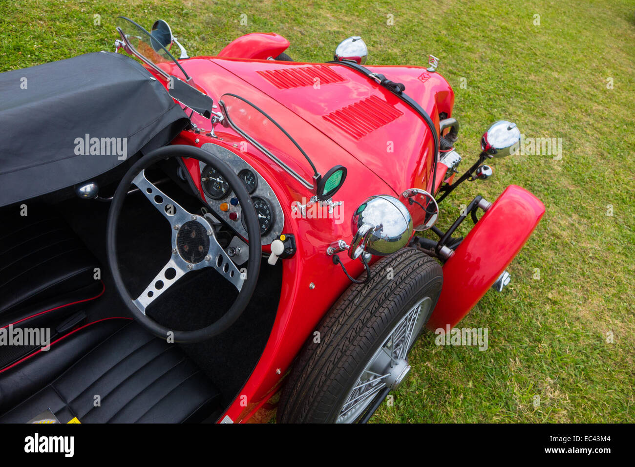 Three wheel kit car in red at the Locomotion Day in Francueil, France ...