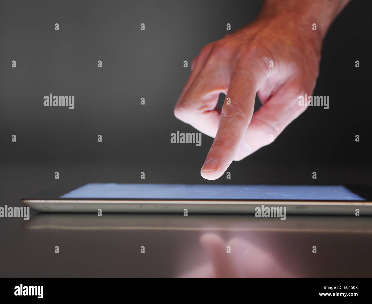 hand presses on screen digital tablet Stock Photo - Alamy