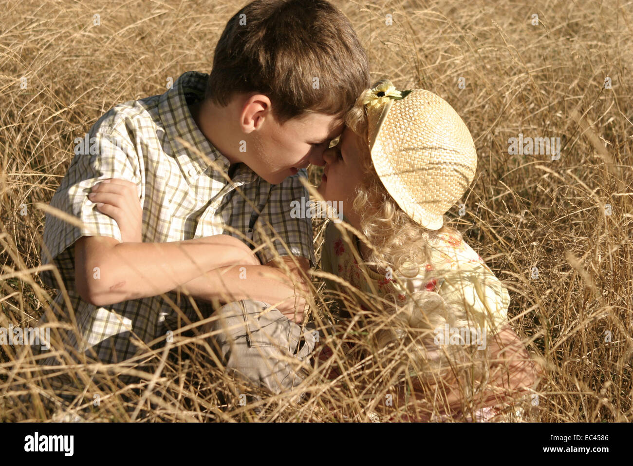 Children in Field Stock Photo - Alamy