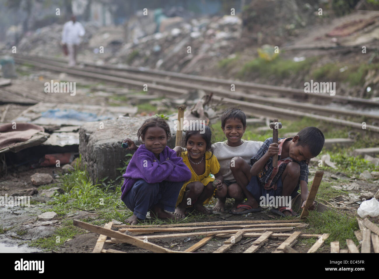 Dhaka, Bangladesh. 9th Dec, 2014. Slum children playing near rail line ...