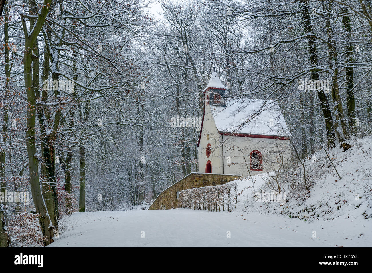 Small wooden church in winter near the german castle Burg Eltz ...