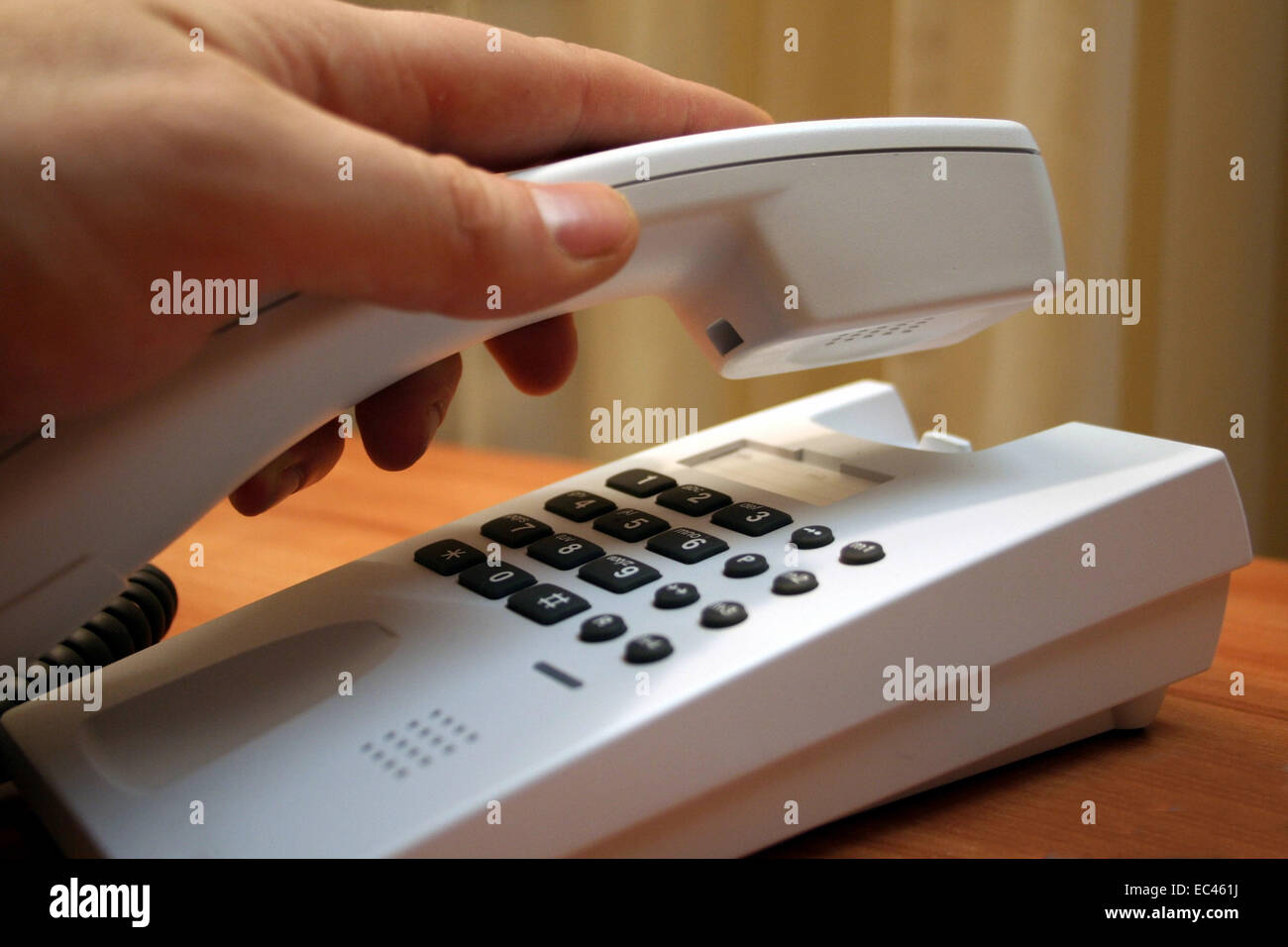 Lift and put down Telephone Handset Stock Photo - Alamy