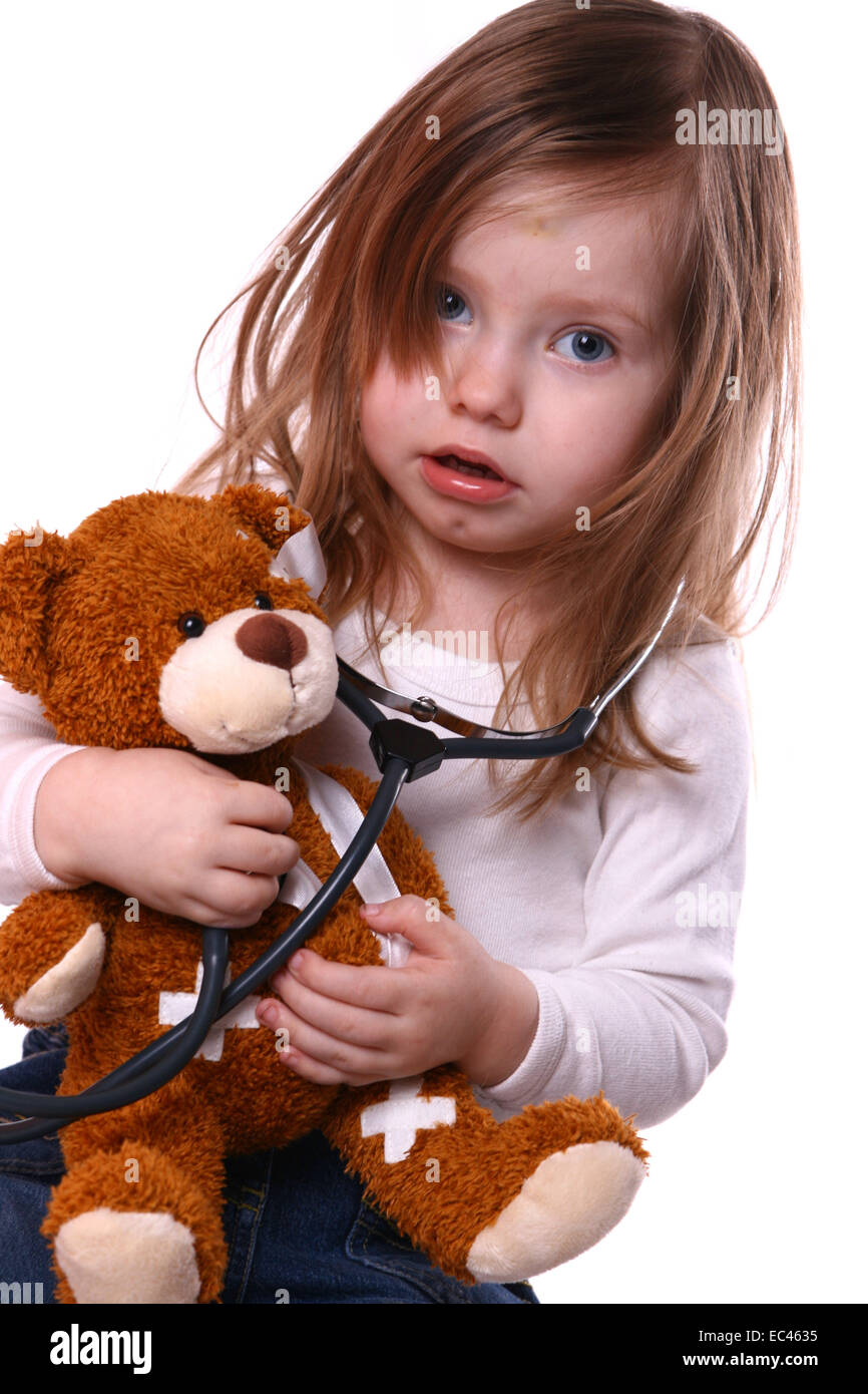 Girl with hurt Teddy Stock Photo - Alamy