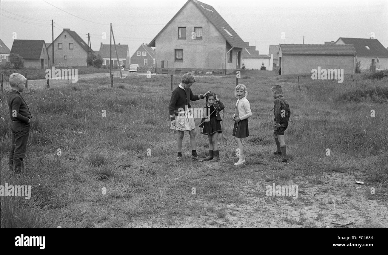 children play 1965 Stock Photo - Alamy