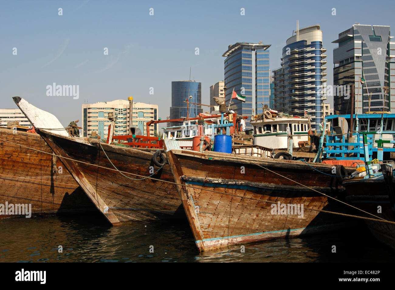 Traditional Dhow ships moored in the Dubai Creek in front of the ...