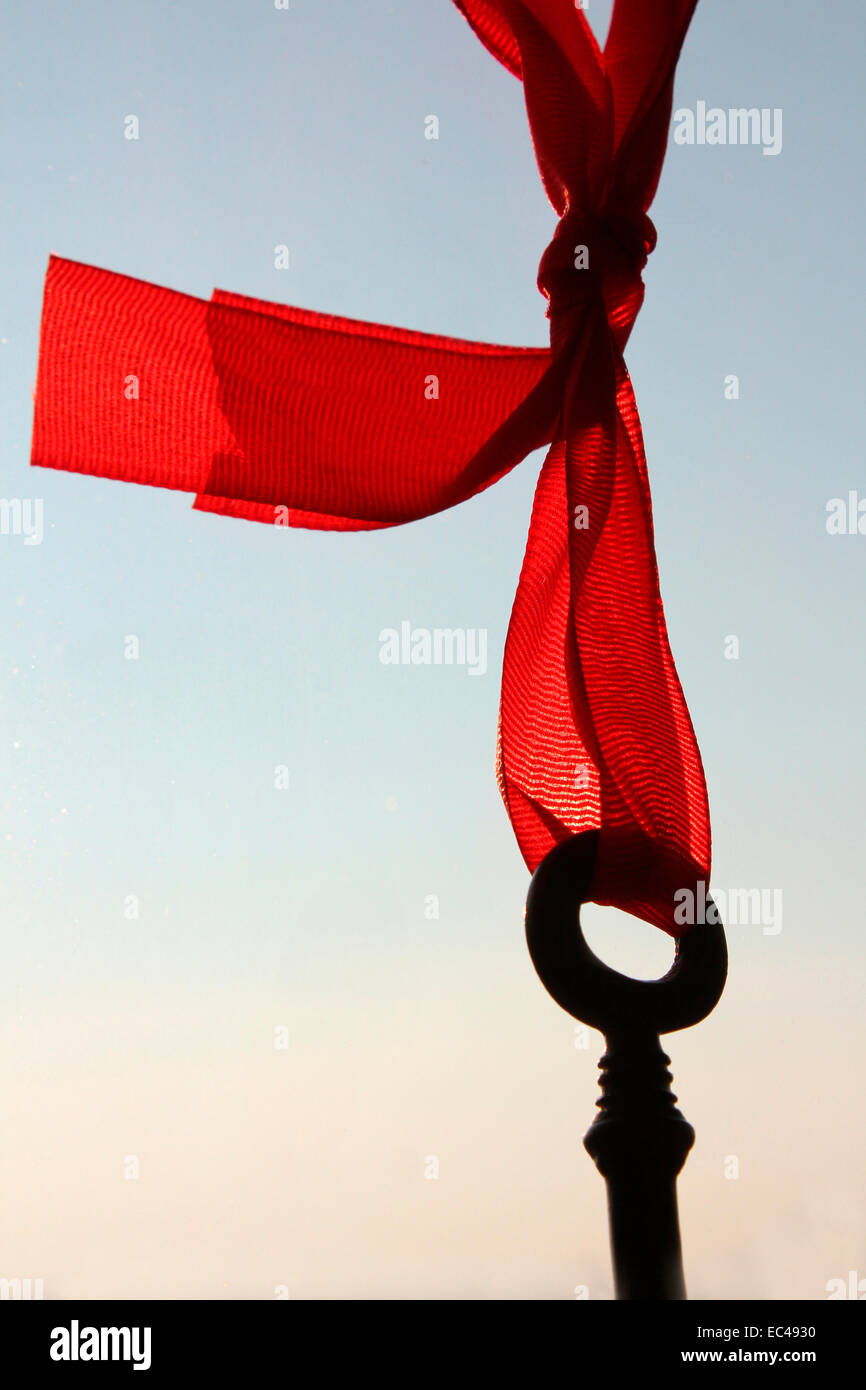 Key with red Stock Photo - Alamy