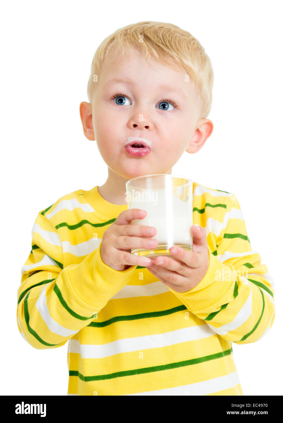 Pretty kid drinking milk from glass Stock Photo - Alamy