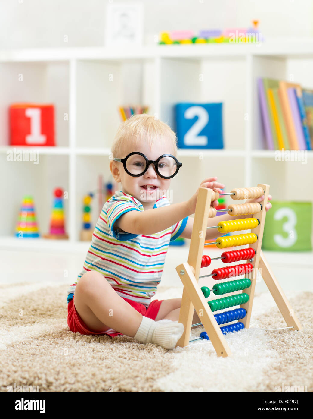 Boy counting abacus hi-res stock photography and images - Alamy