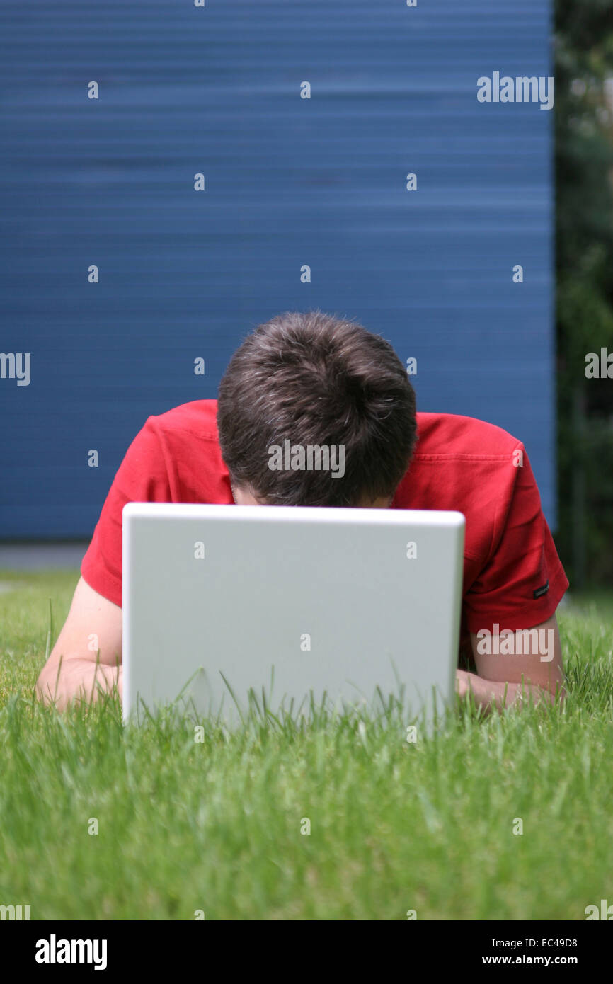 Daylight work with a notebook Stock Photo - Alamy