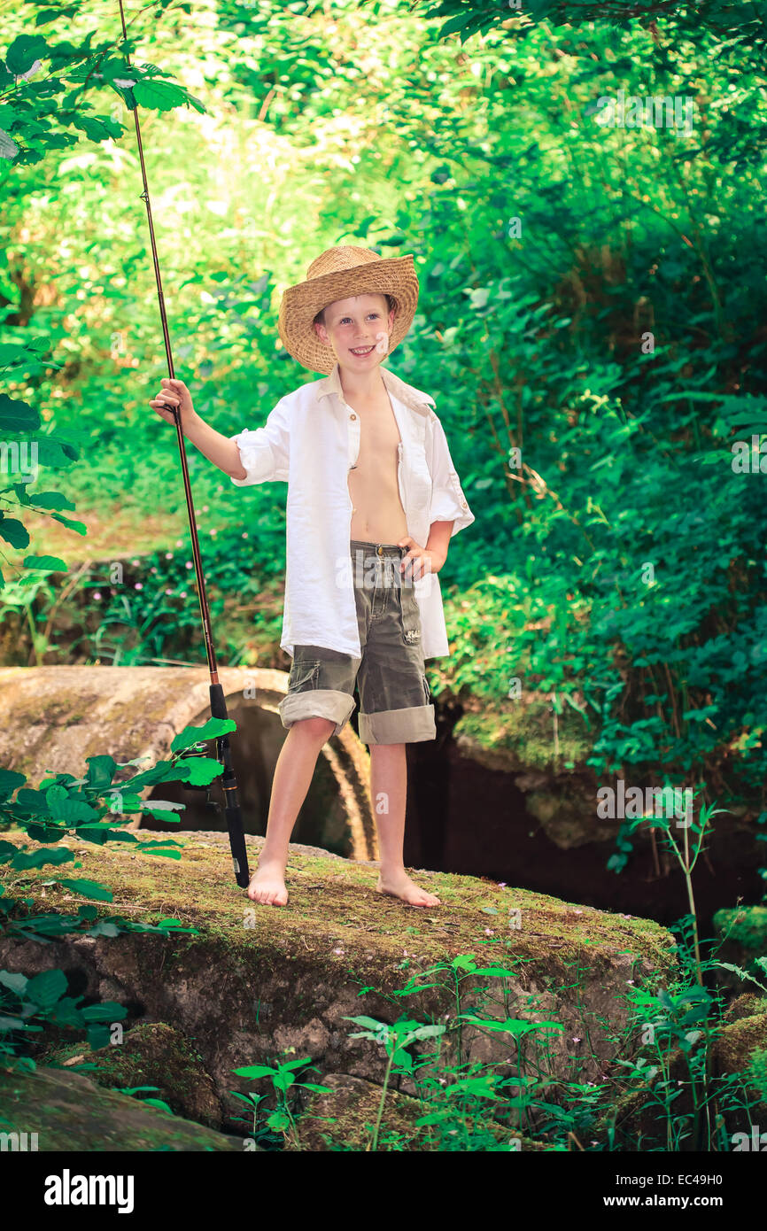 outdoor portrait of a young fishing boy Stock Photo - Alamy