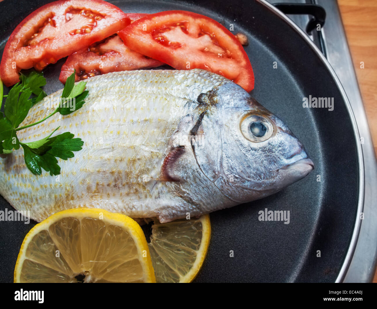 descaled fresh sea bream fish marinated prepared for roasting Stock ...