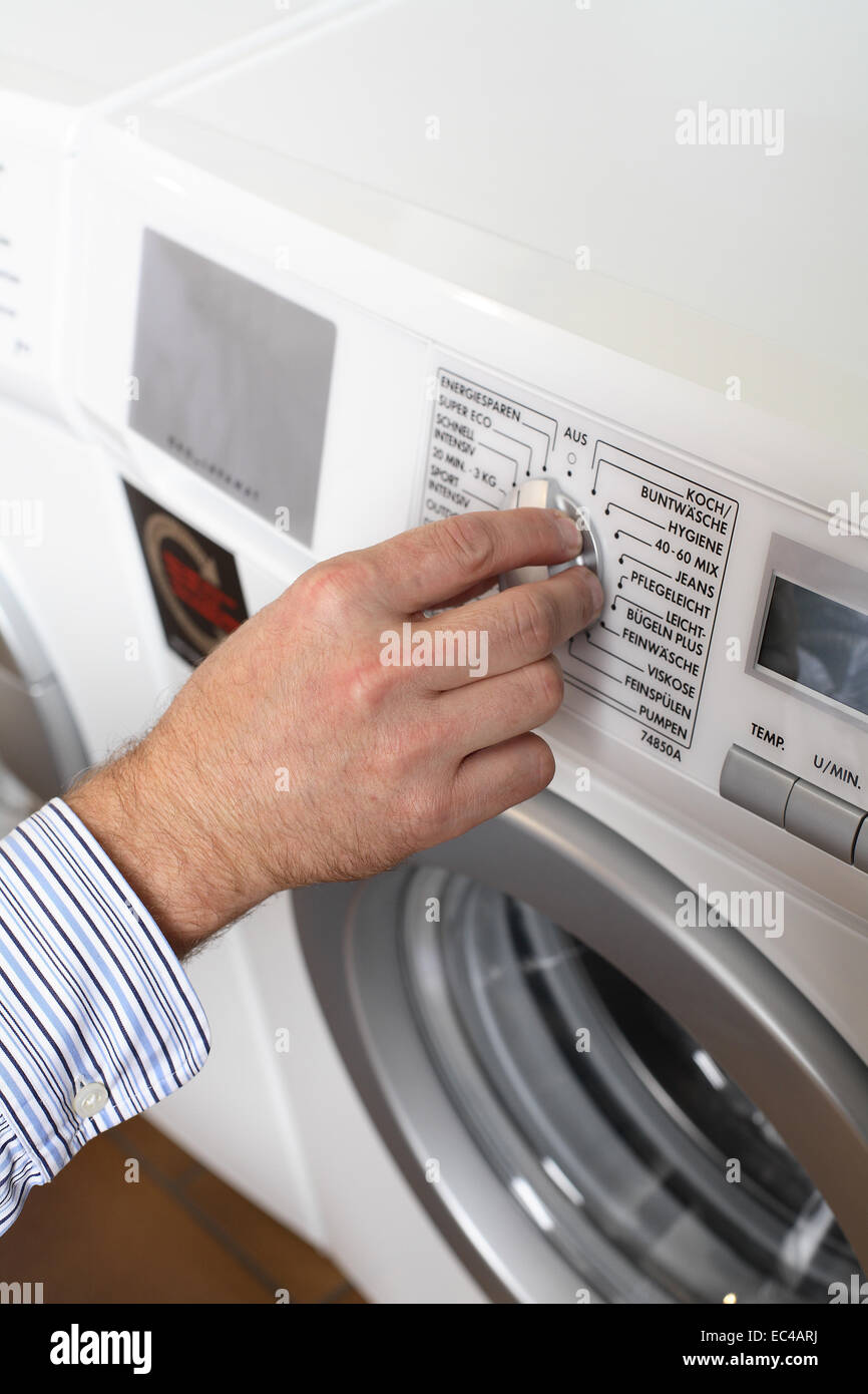 Handling of a Washing Machine Stock Photo - Alamy