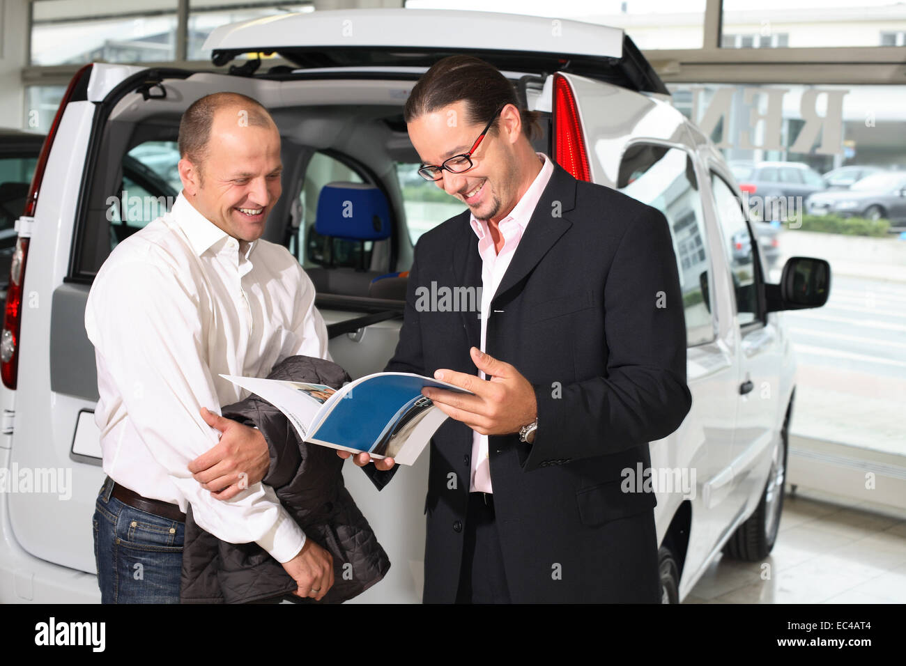 Salesman and Client Stock Photo - Alamy
