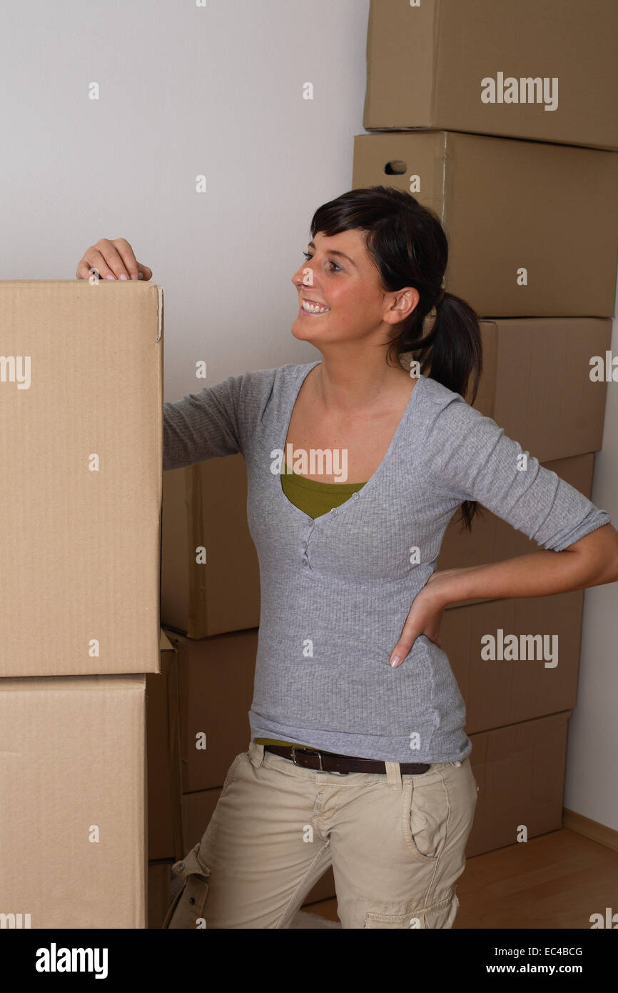 Young Woman Moving Home Stock Photo - Alamy