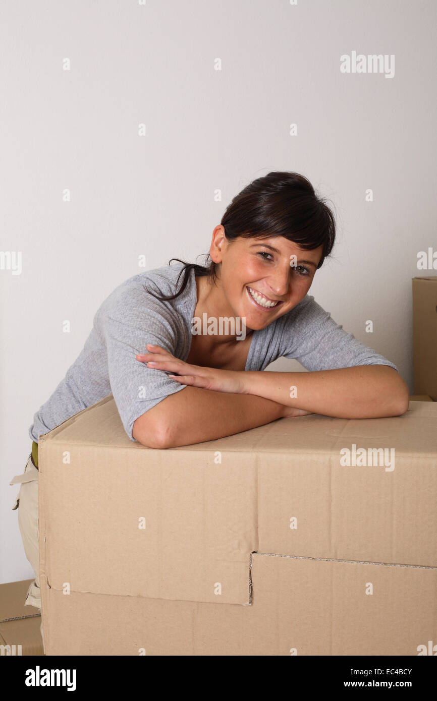 Young Woman Moving Home Stock Photo - Alamy
