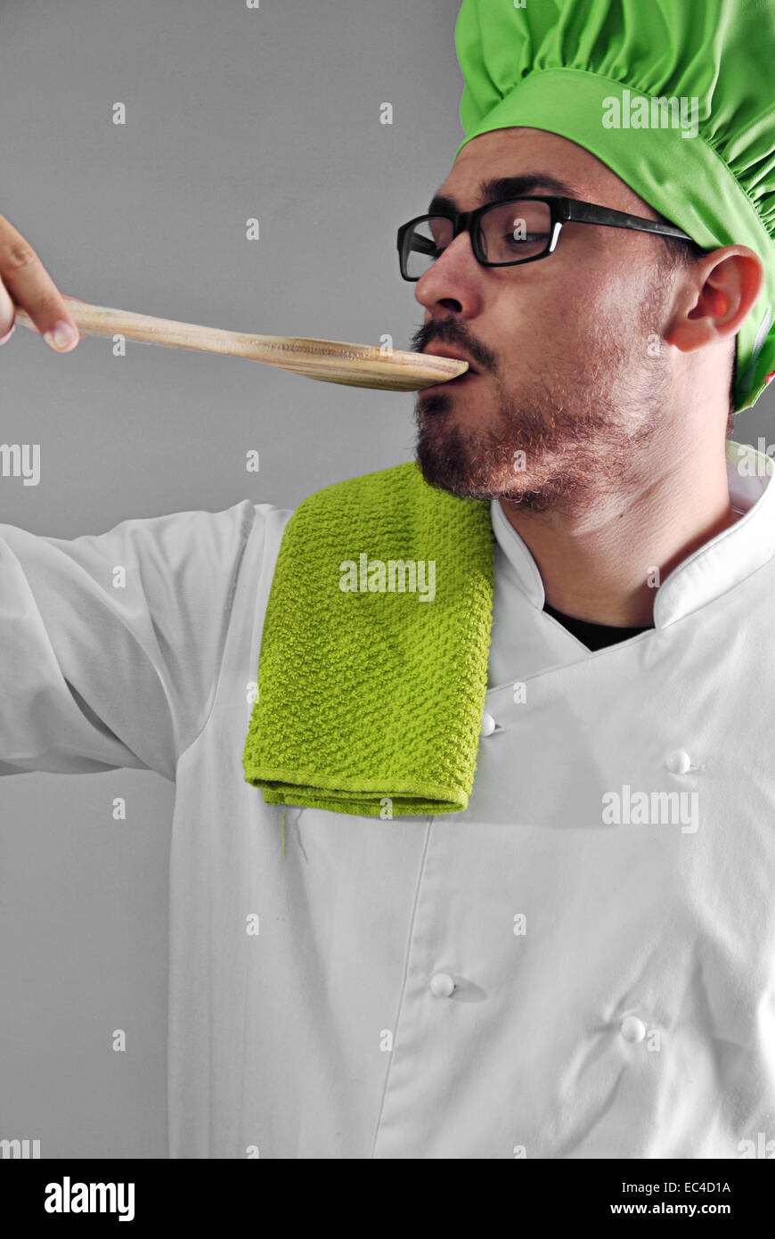 Cook with all his work clothes and cutlery for the kitchen Stock Photo ...