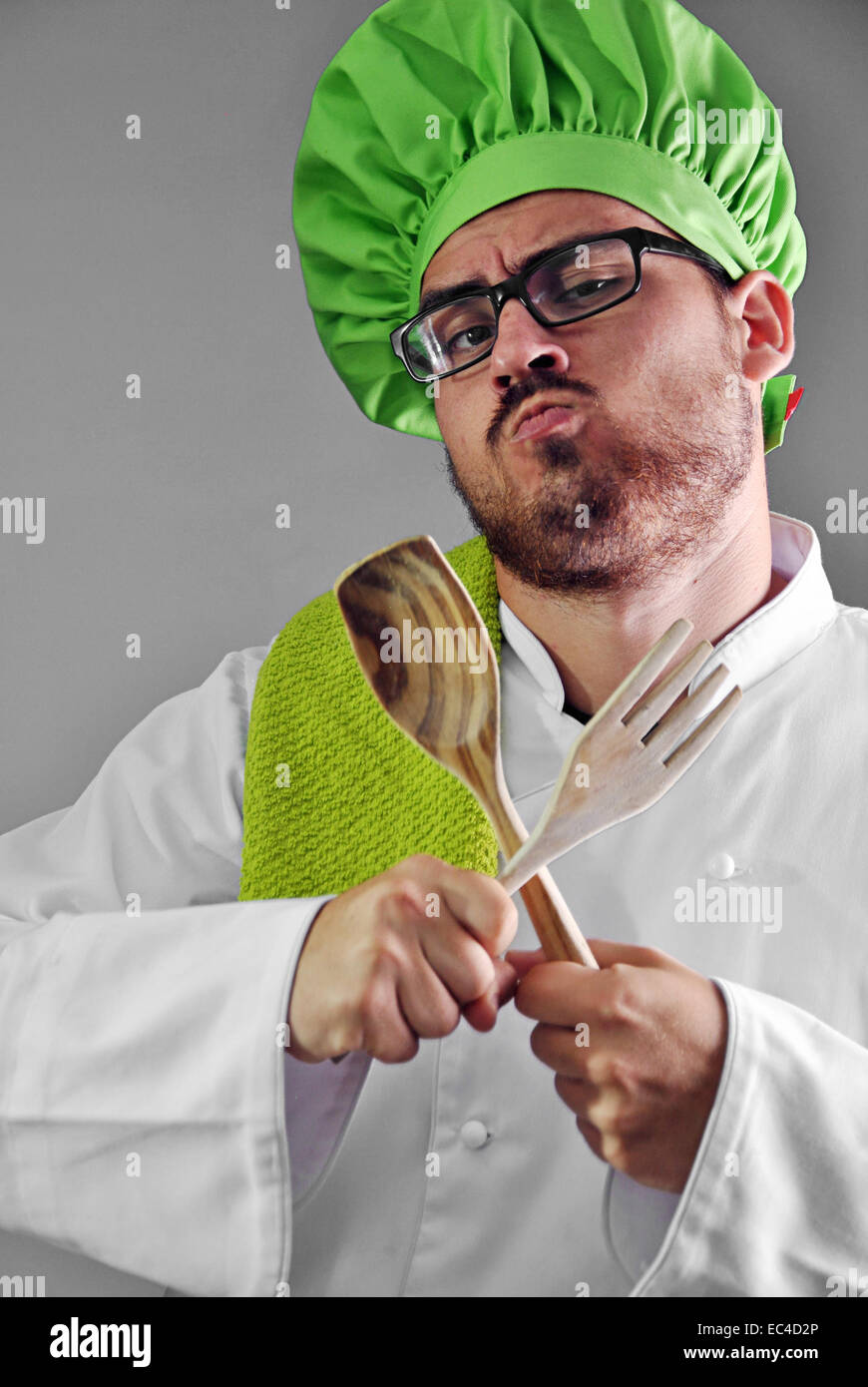 Cheff with all his work clothes and cutlery for the kitchen Stock Photo ...