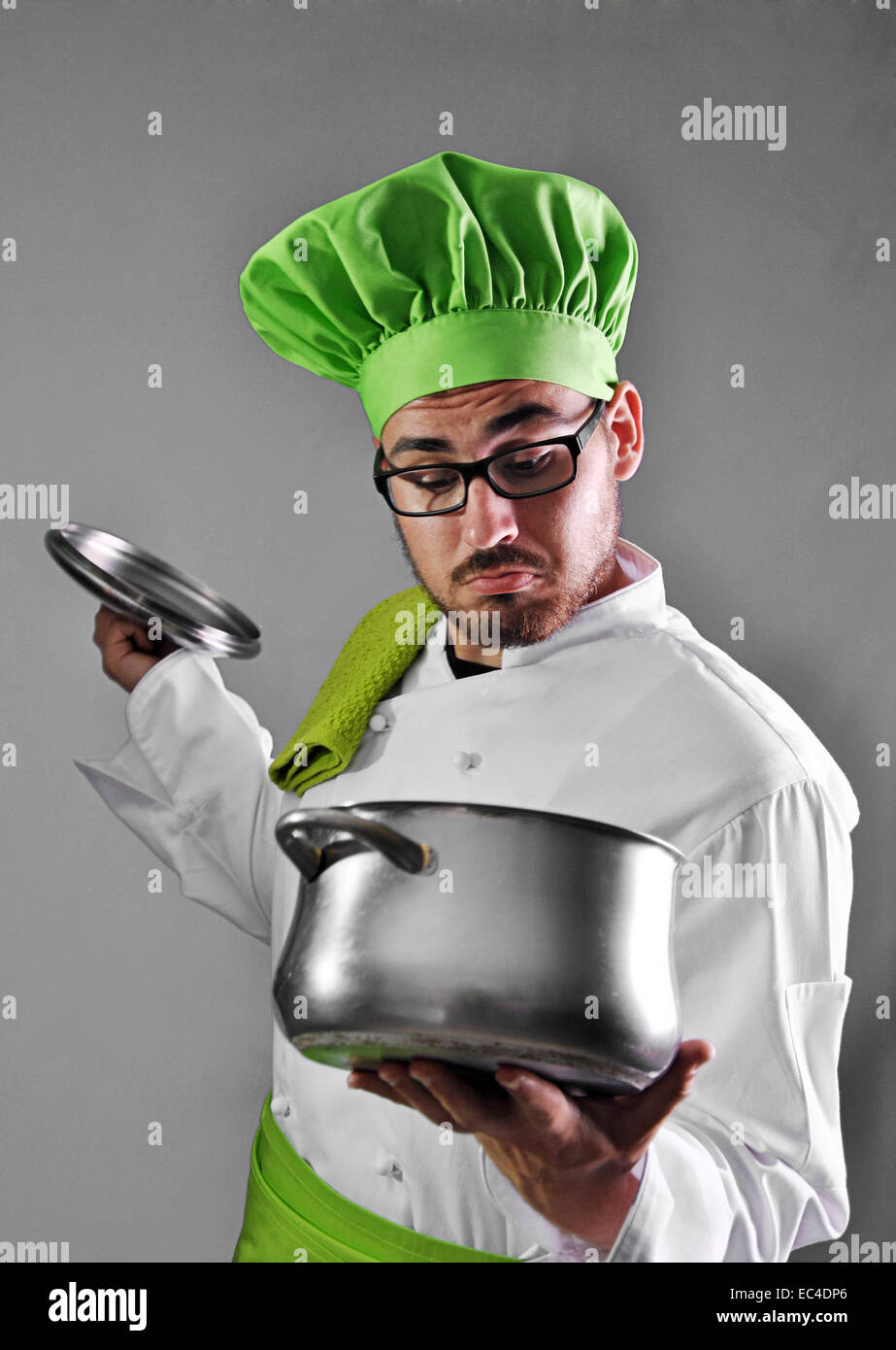 Cooker with all his work clothes and cutlery for the kitchen Stock ...