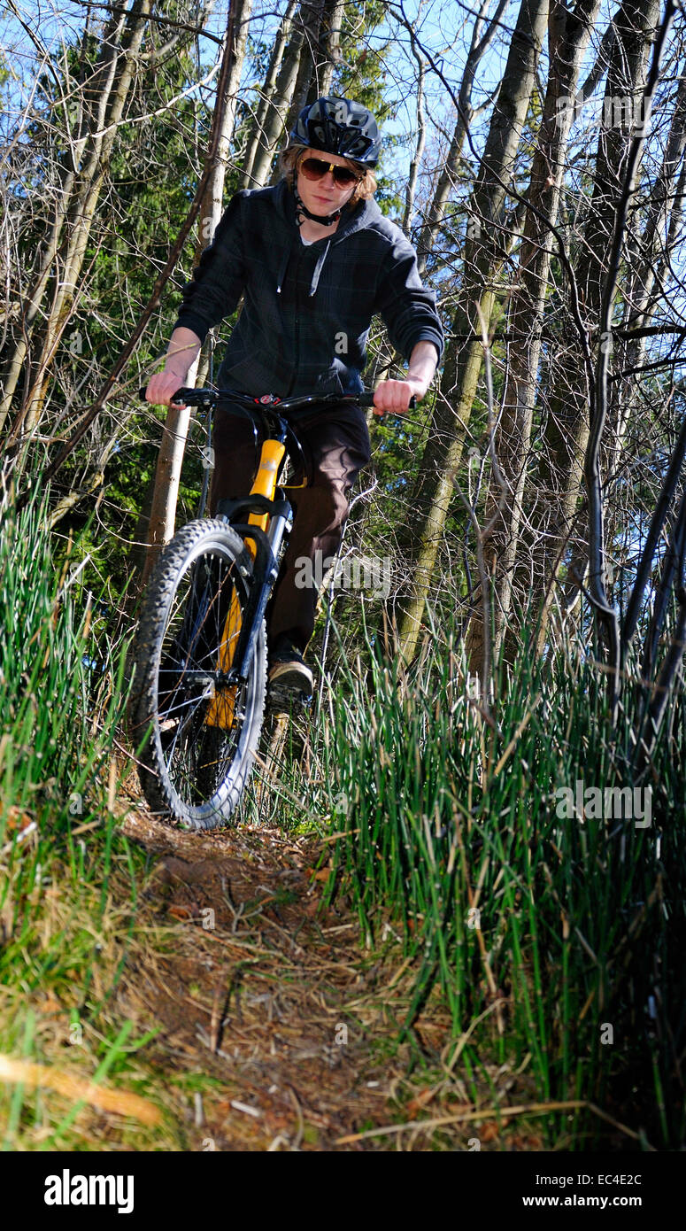 A guy is driving with his Mtb Stock Photo - Alamy
