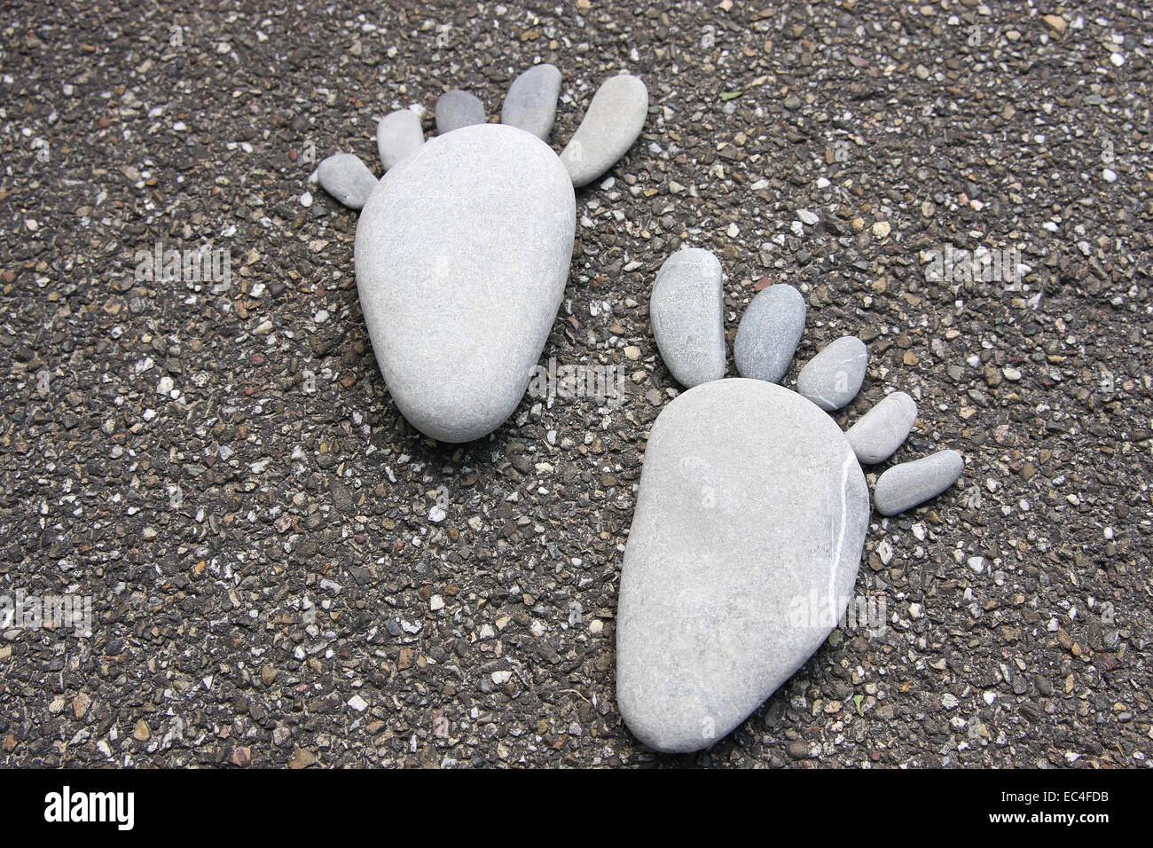 feet from stones Stock Photo - Alamy