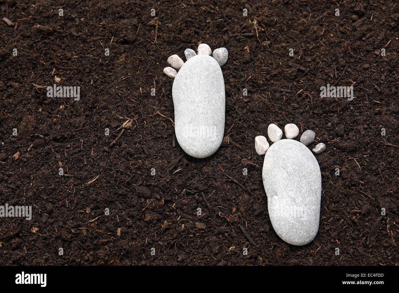 feet from stones Stock Photo - Alamy