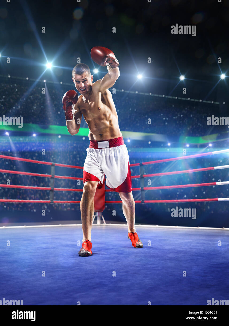 Professionl boxer is standing on the ring Stock Photo - Alamy