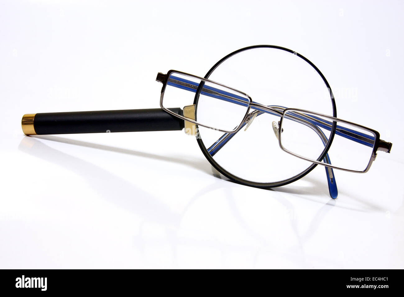 magnifying and glasses Stock Photo - Alamy