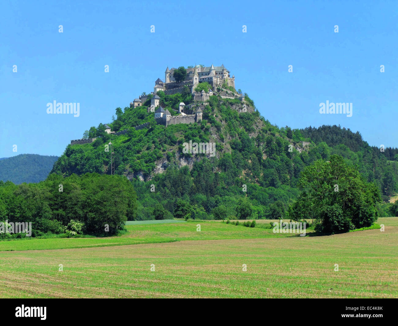 Castle hochosterwitz with meadows and bushes Stock Photo - Alamy