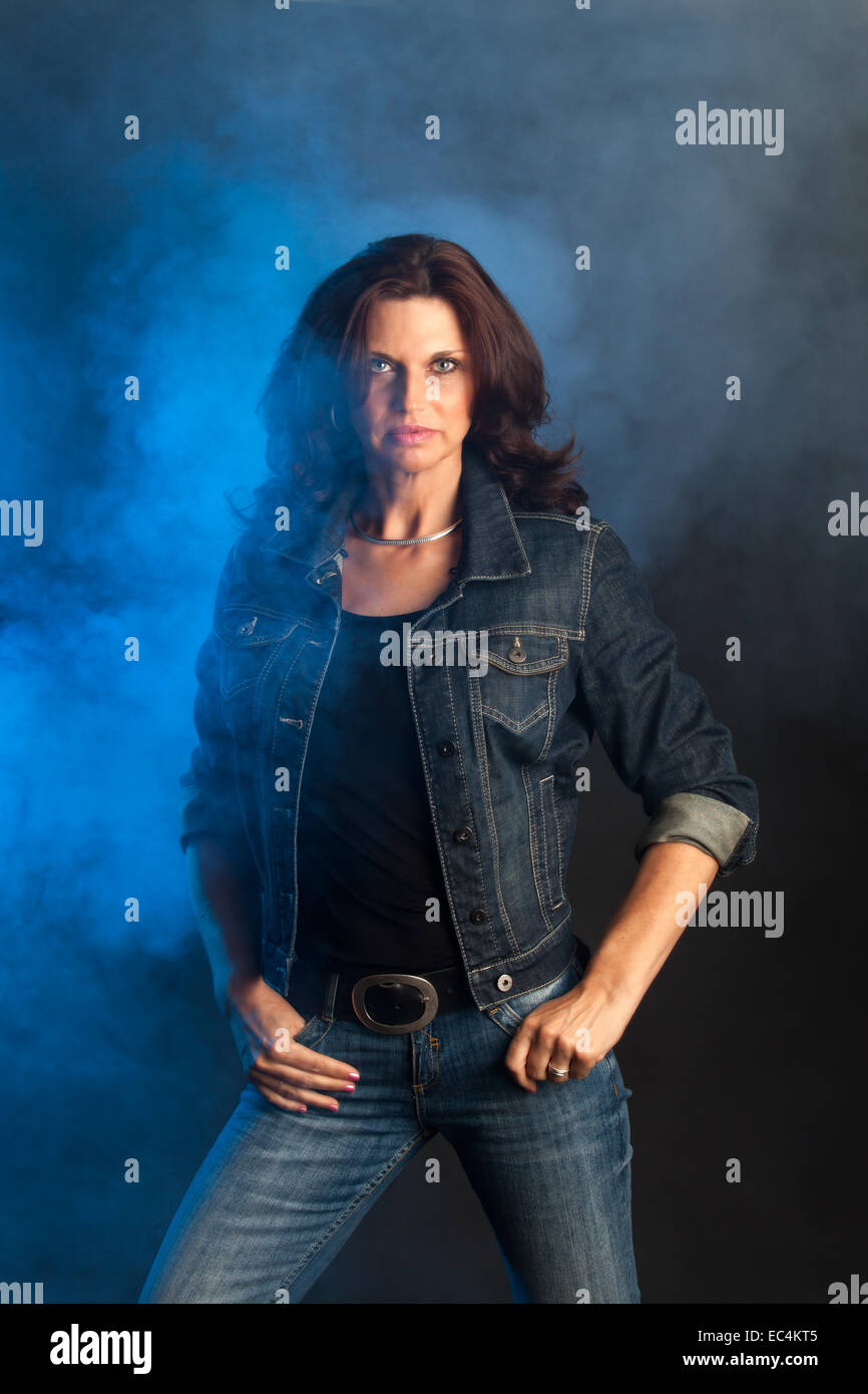 Woman in the fog Stock Photo - Alamy