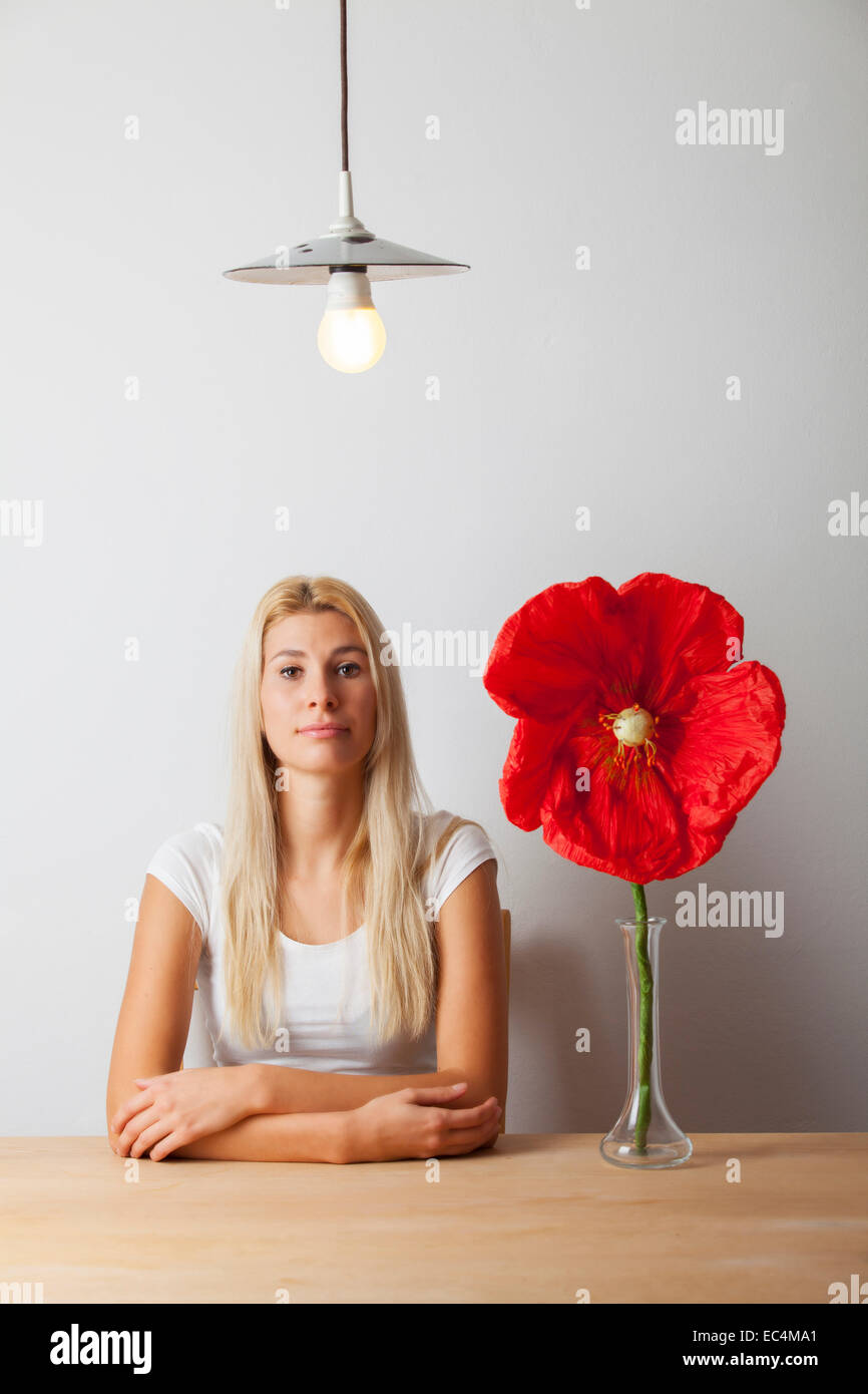 Woman with a flower Stock Photo - Alamy