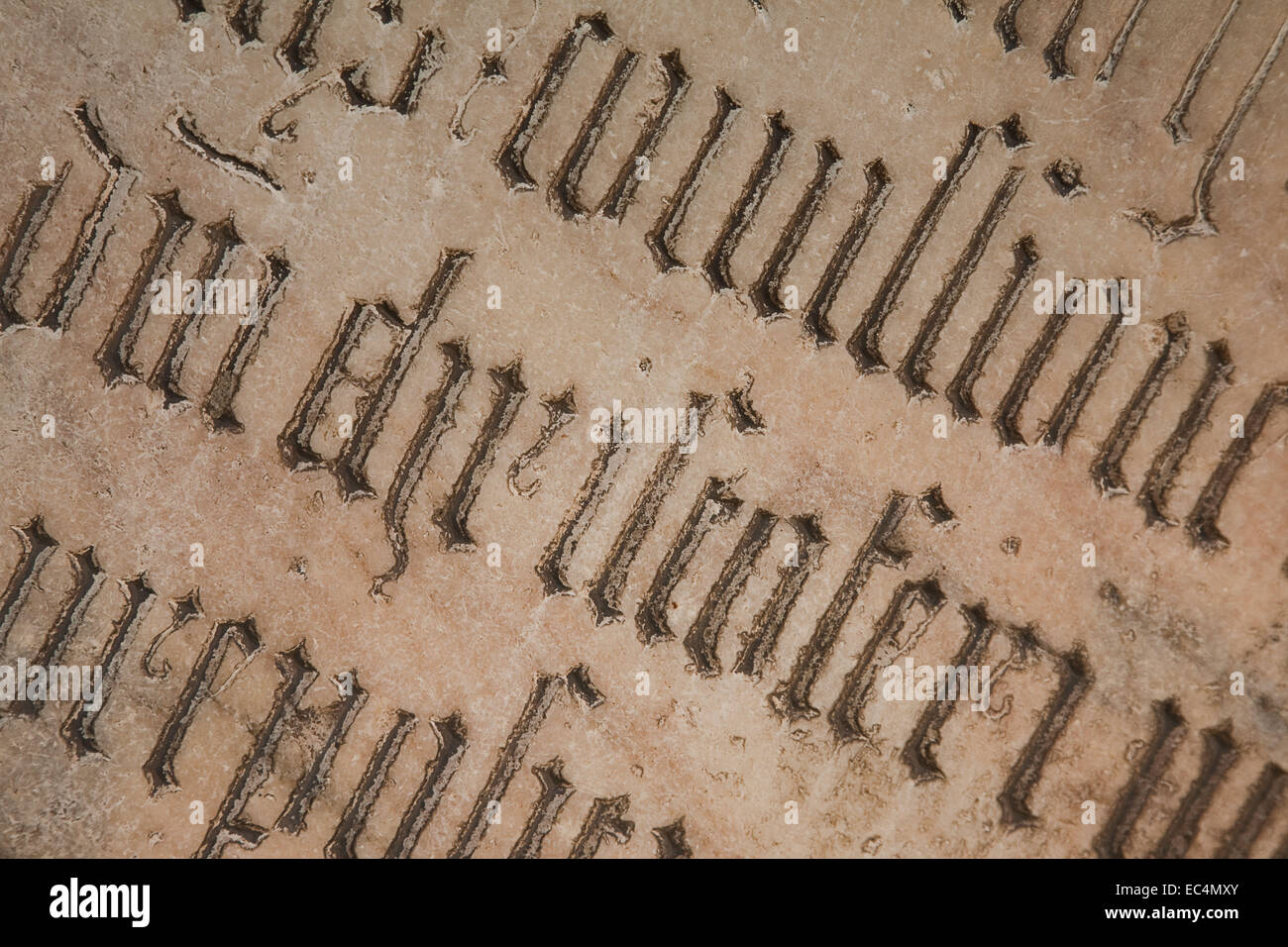 Stone slab with ancient historical characters Stock Photo - Alamy