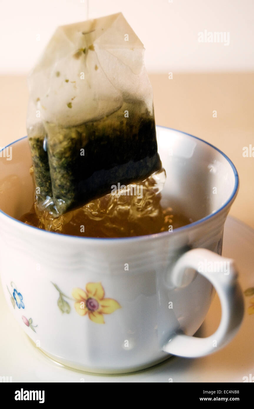 Cup and a tea bag Stock Photo - Alamy